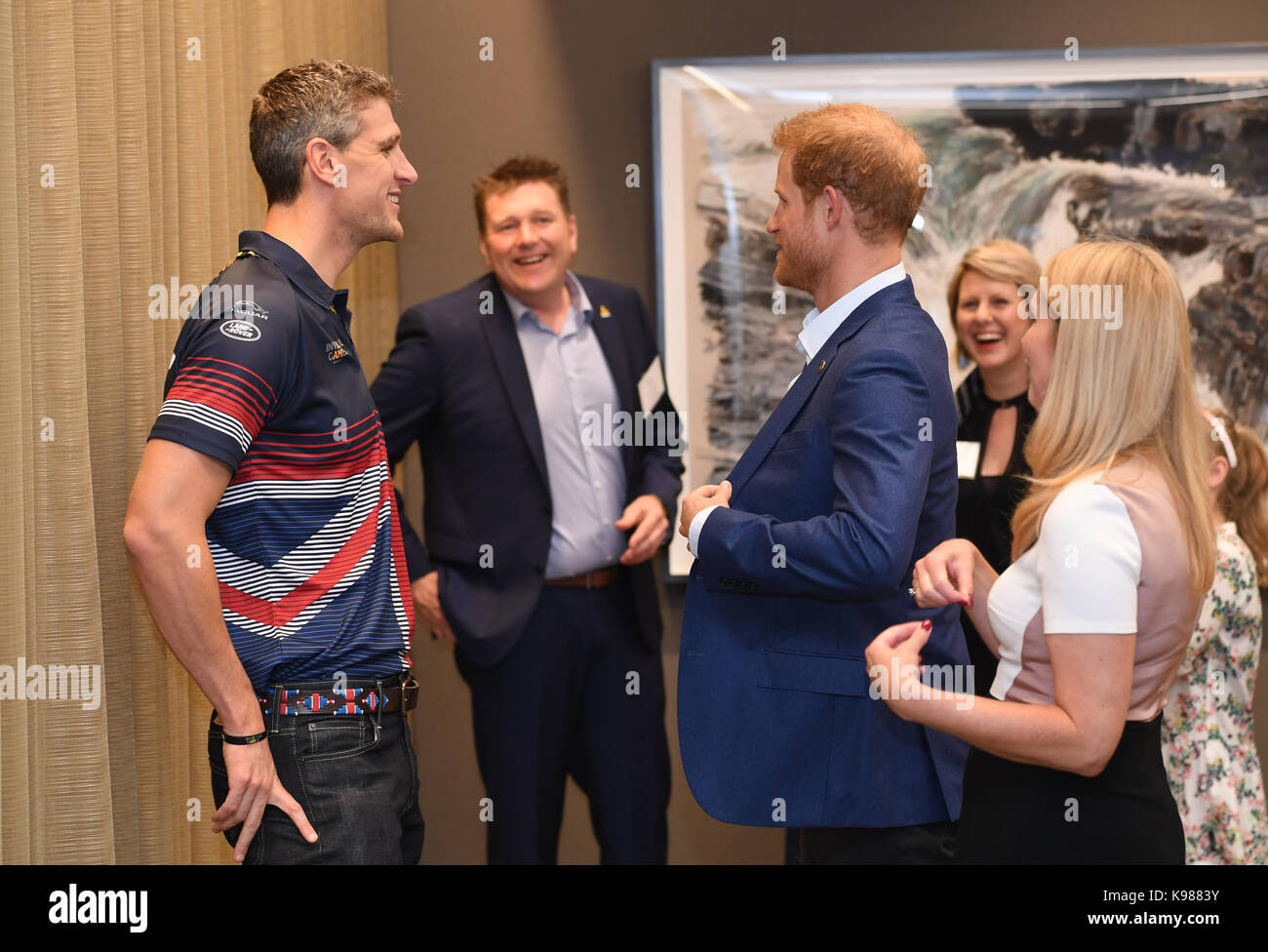 Prince Harry speaks to David Wiseman from Team GB as he attends the ...