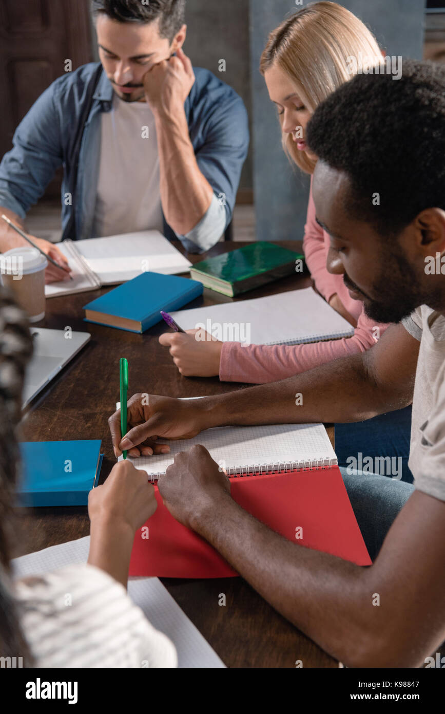 Students writing hi-res stock photography and images - Alamy