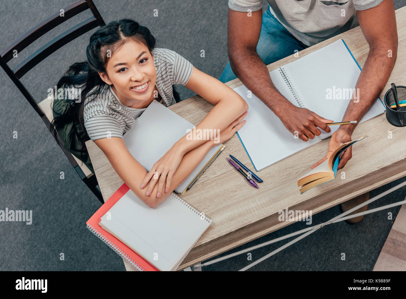multiethnic students doing homework Stock Photo - Alamy