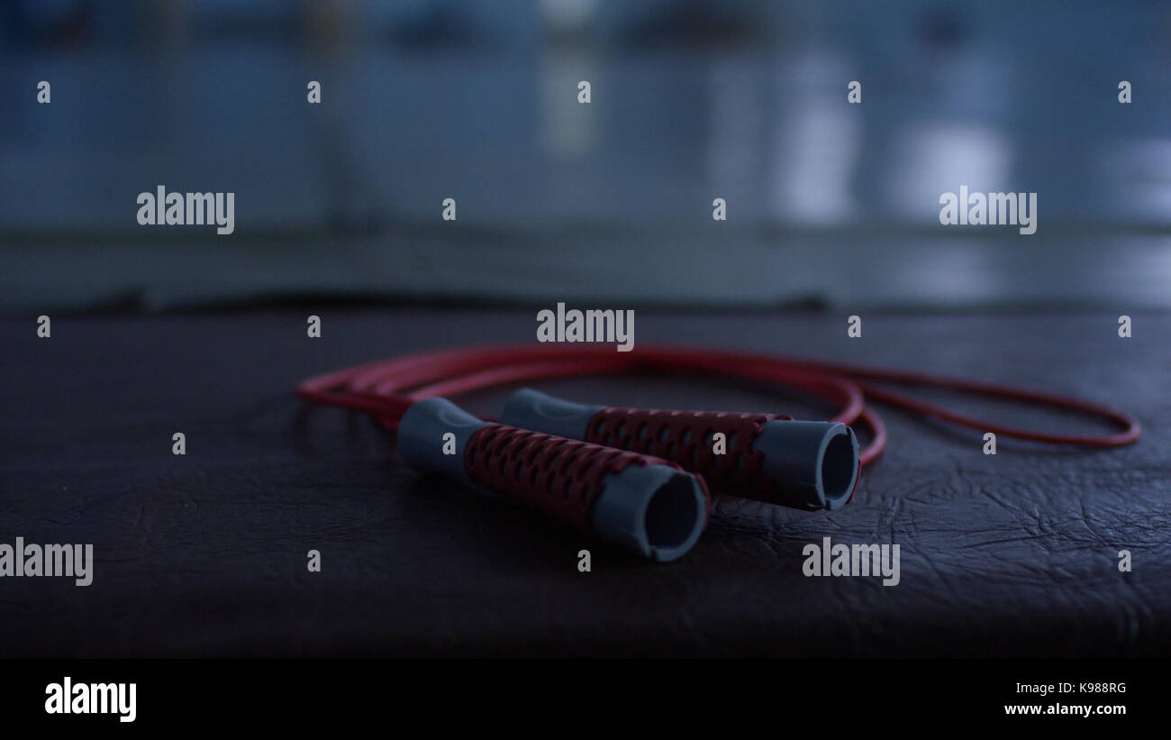 Red jump rope black handles hi-res stock photography and images - Alamy