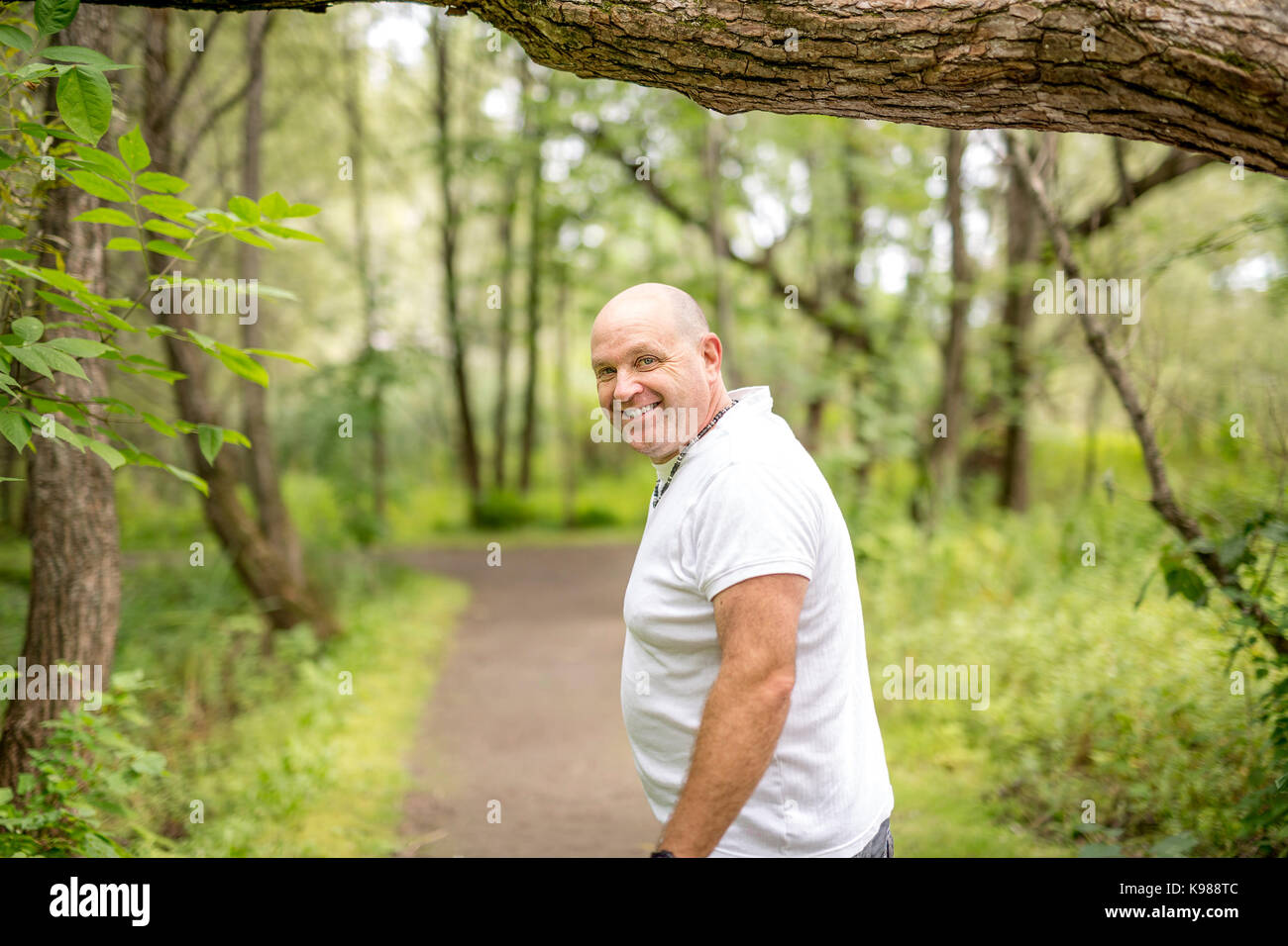 A men outdoors close to 50s in forest Stock Photo - Alamy