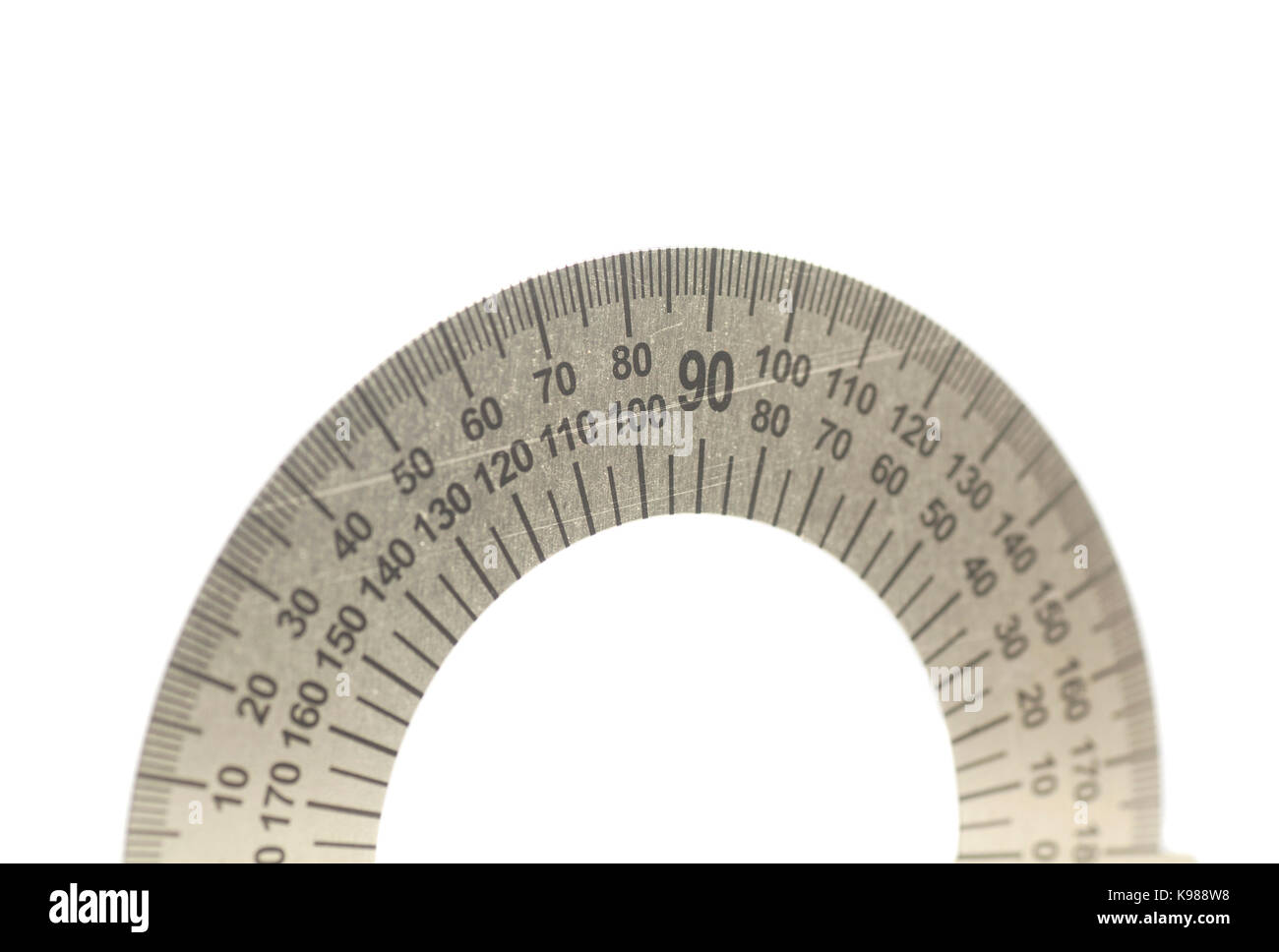 Metal protractor isolated on white background Stock Photo - Alamy