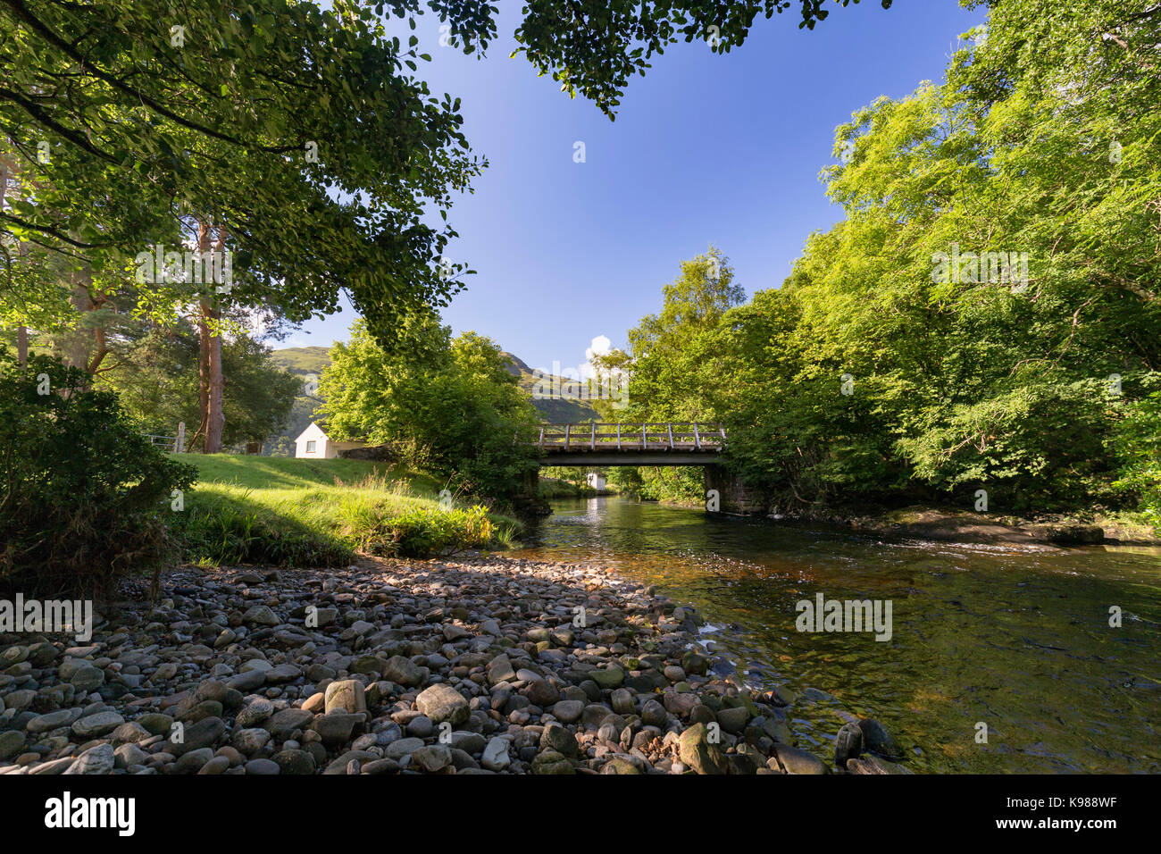 The Ailort river in the early morning sunlight in Lochailort, Scotland ...