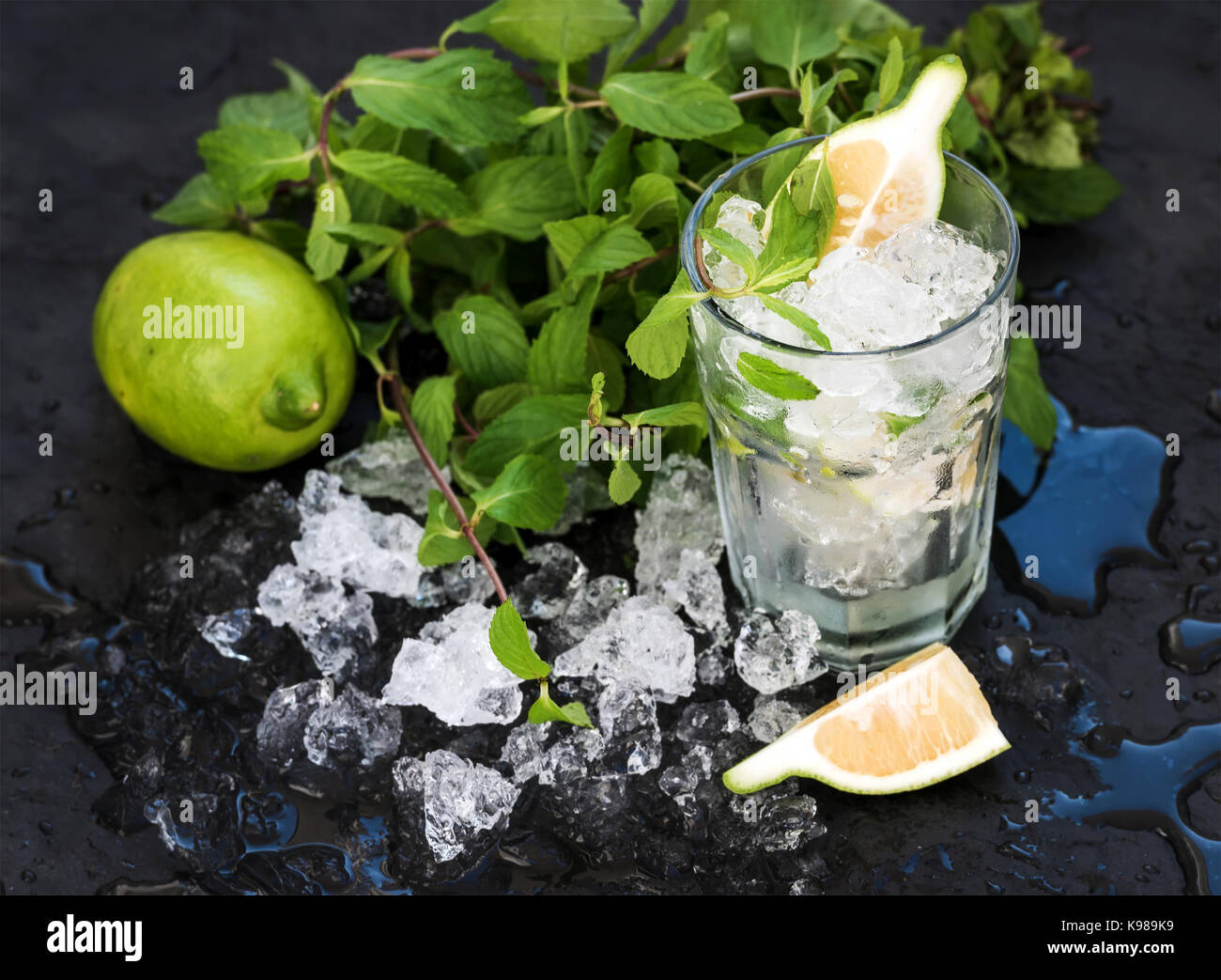 Mojito cooking set. Bunch of fresh mint, lime, chipped ice and coctail ...
