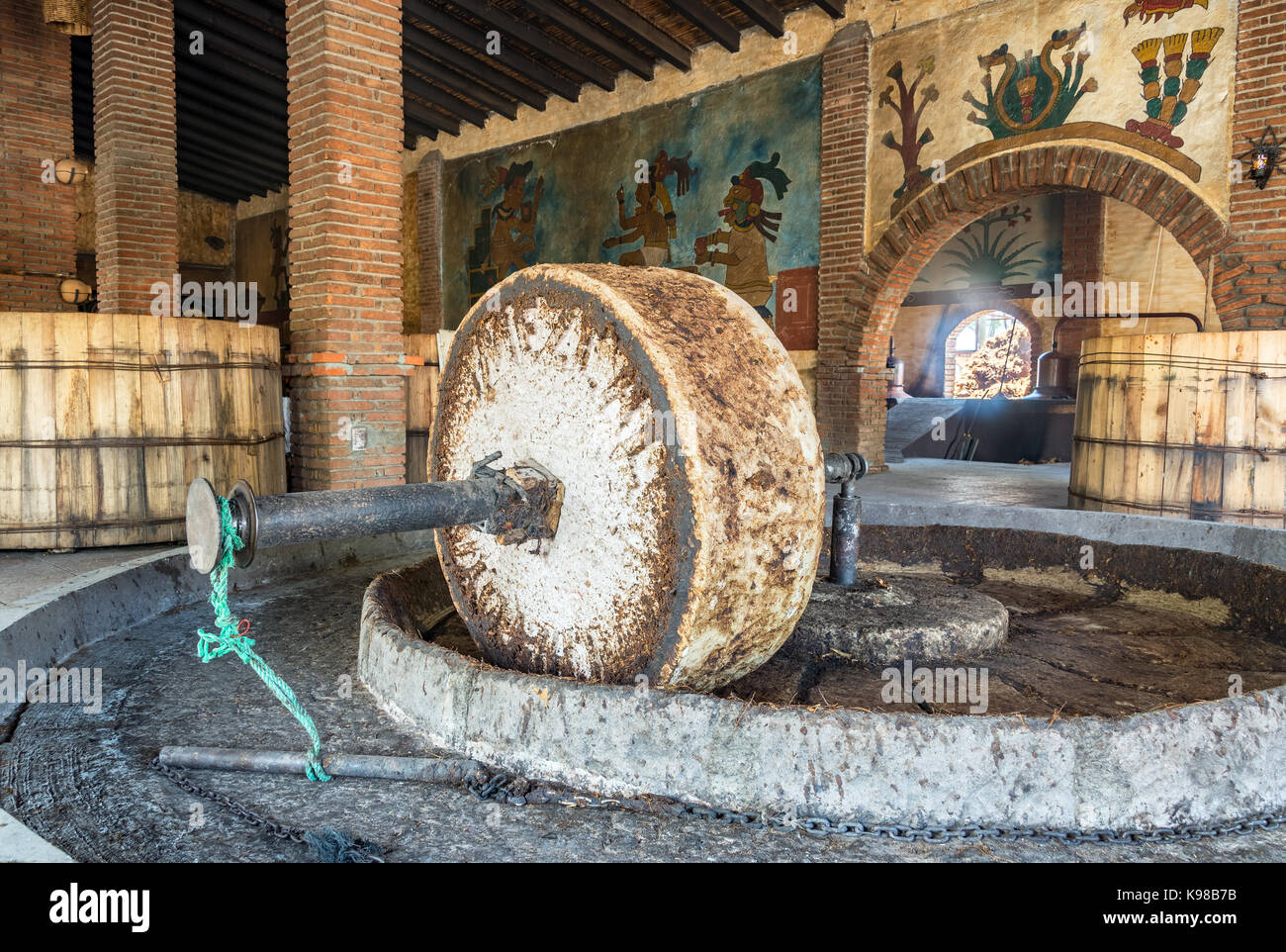 Stone grinding wheel in an old mezcal distillery in Oaxaca, Mexico ...
