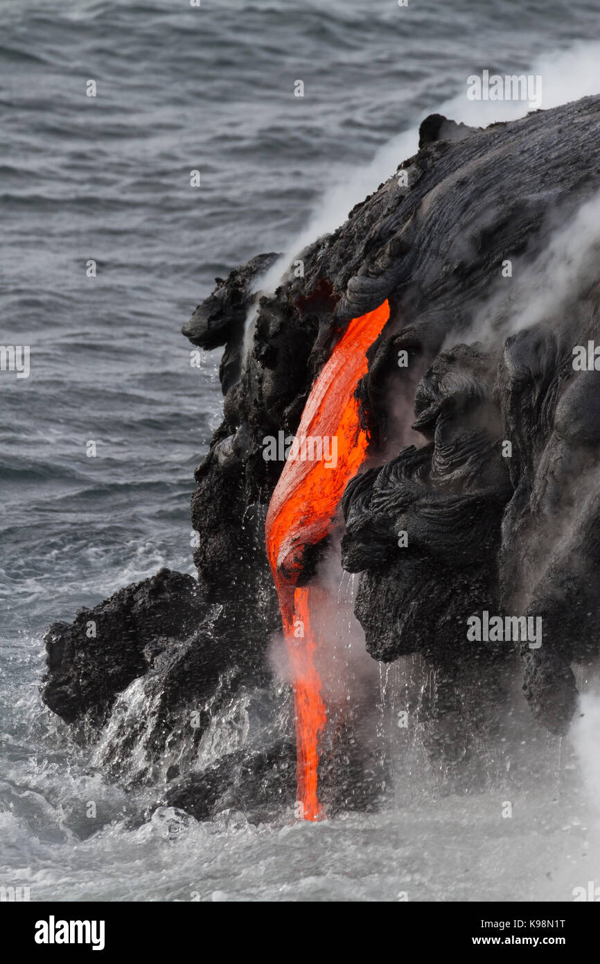 Lava flow entering ocean hi-res stock photography and images - Alamy