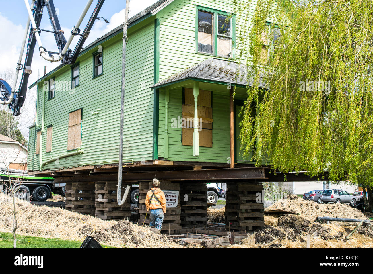 Jacked Up Green House Stock Photo - Alamy