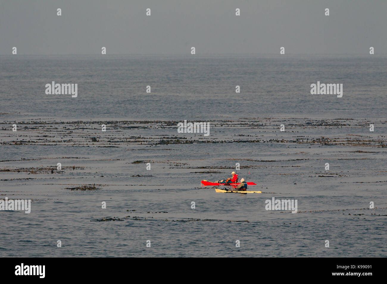 Two Kayaks on Ocean Stock Photo - Alamy