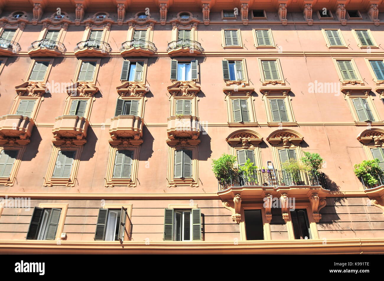 Typical orange color of the facade of a house in Rome.City Apartments ...