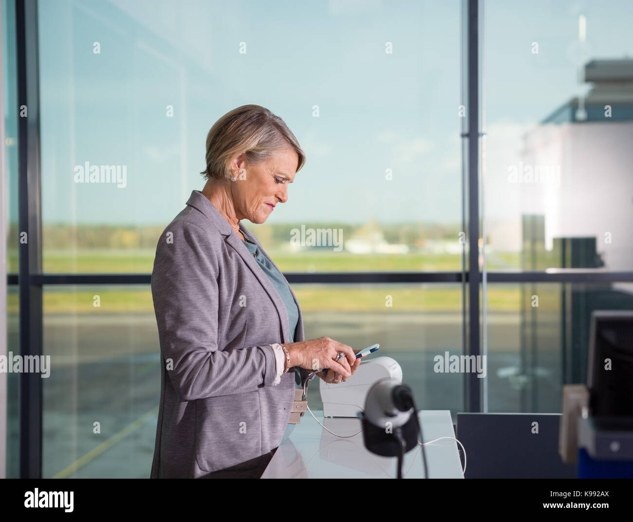 Passenger holding mobile phone in hi-res stock photography and images ...