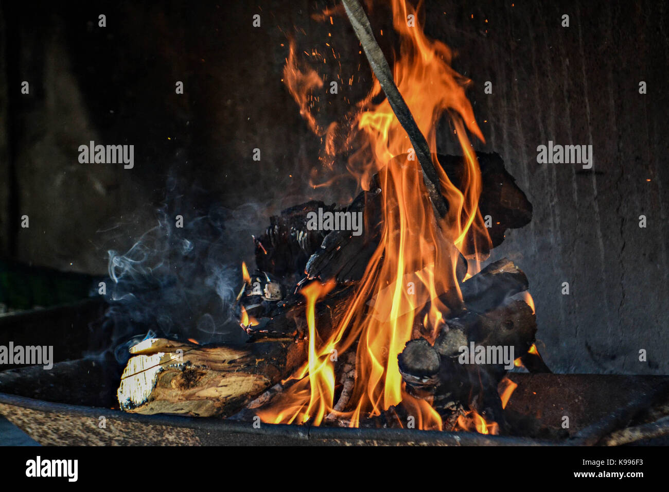 Open fire at the open fireplace Stock Photo - Alamy
