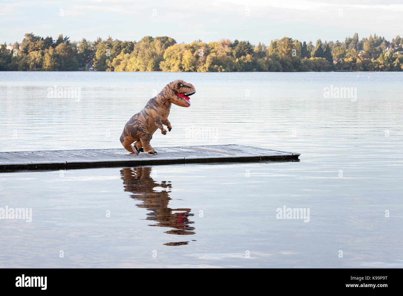 Seattle, Washington, USA. 21st Sep, 2017. A performer in a T. rex ...