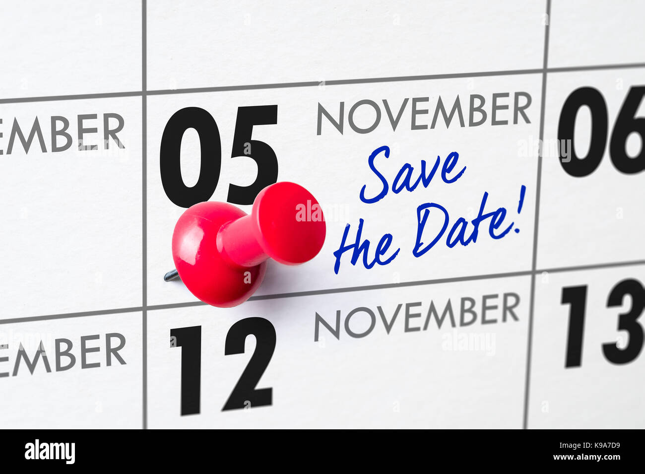 Wall calendar with a red pin - November 05 Stock Photo - Alamy