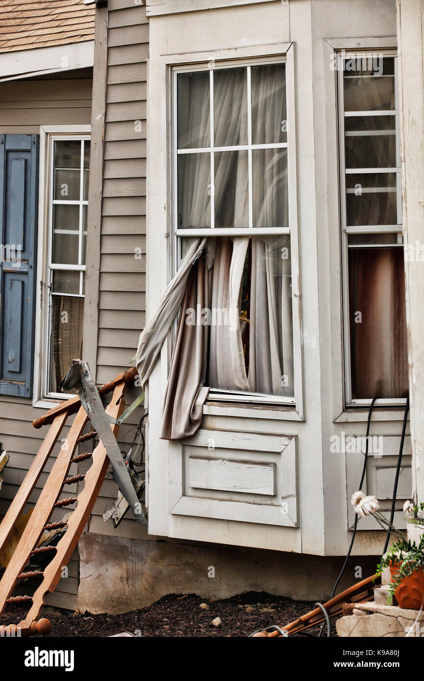 Wooden house damaged by disaster Stock Photo - Alamy