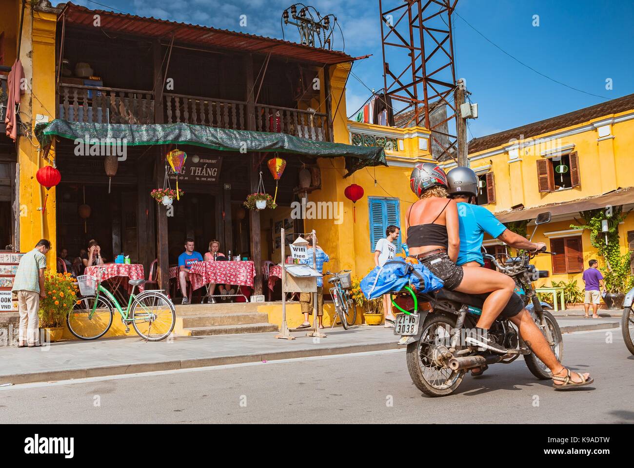 HOI AN, VIETNAM - MARCH 15, 2017: Group of people travel Hoian old town ...