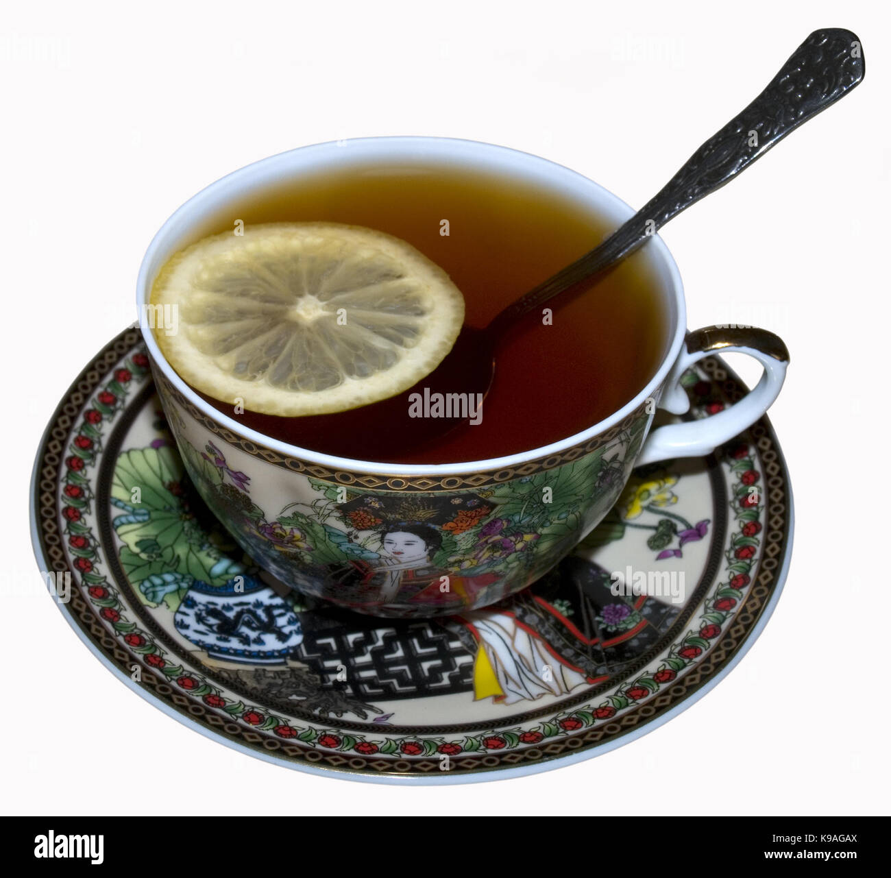 A cup of green tea with lemon Stock Photo - Alamy