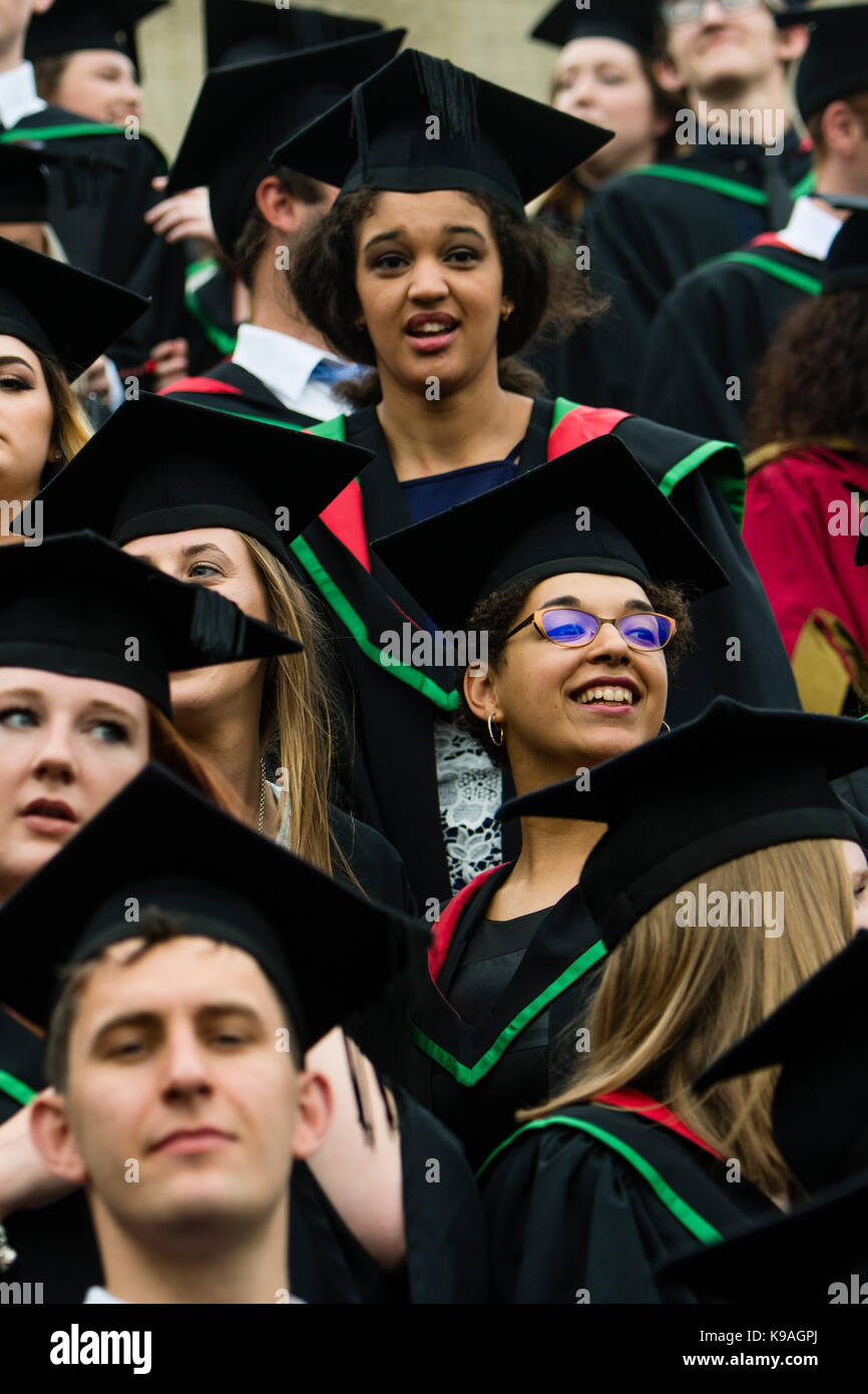 Uk graduates wearing academic gowns hi-res stock photography and images ...