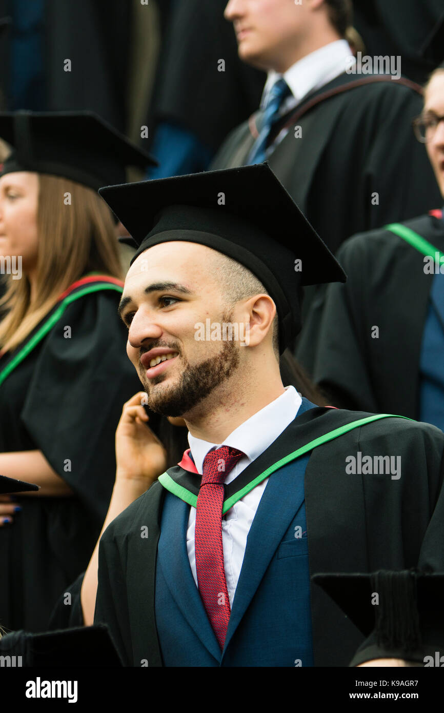 Uk student graduate wearing academic gown hi-res stock photography and ...