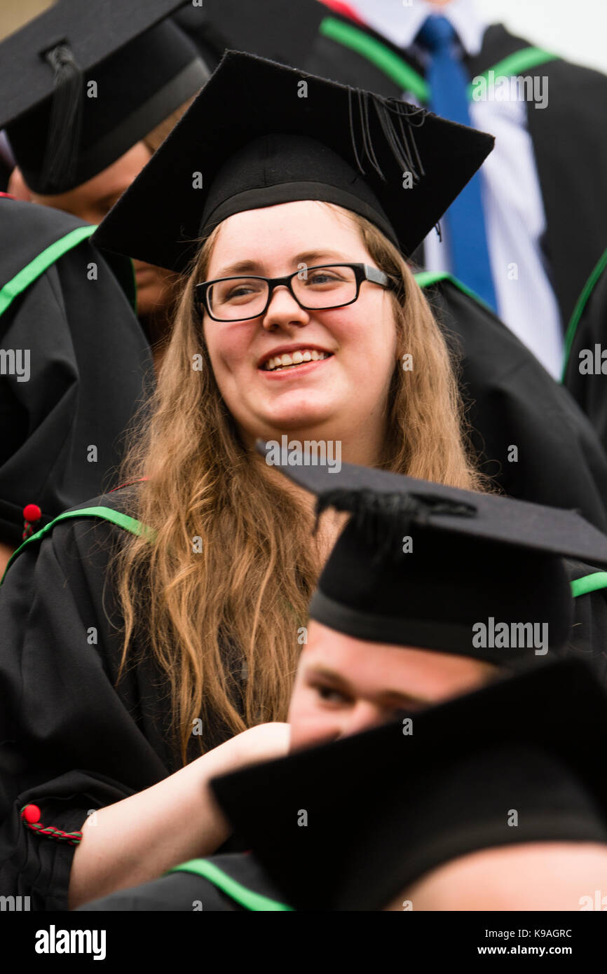 Uk student graduate wearing academic gown hi-res stock photography and ...