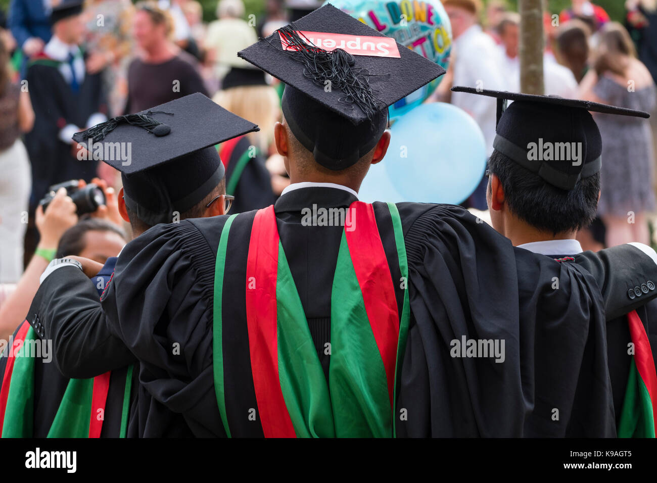 Uk student graduate wearing academic gown hi-res stock photography and ...