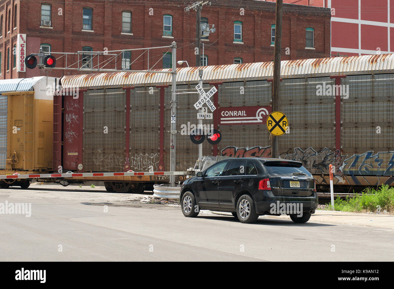Ford Edge car at a railroad crossing in West Bottoms, Kansas City, USA ...