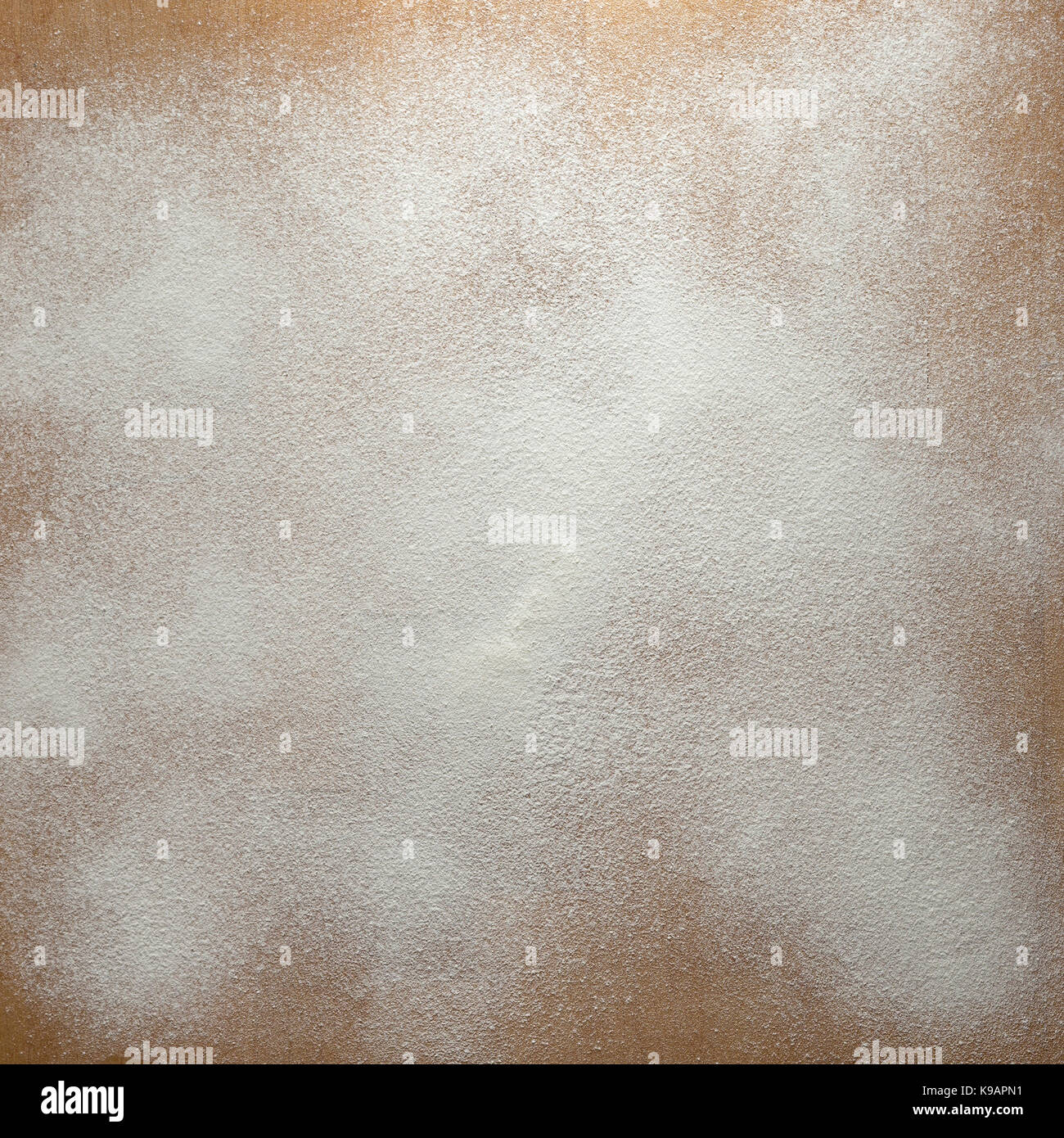 Icing sugar on a wooden board background Stock Photo - Alamy