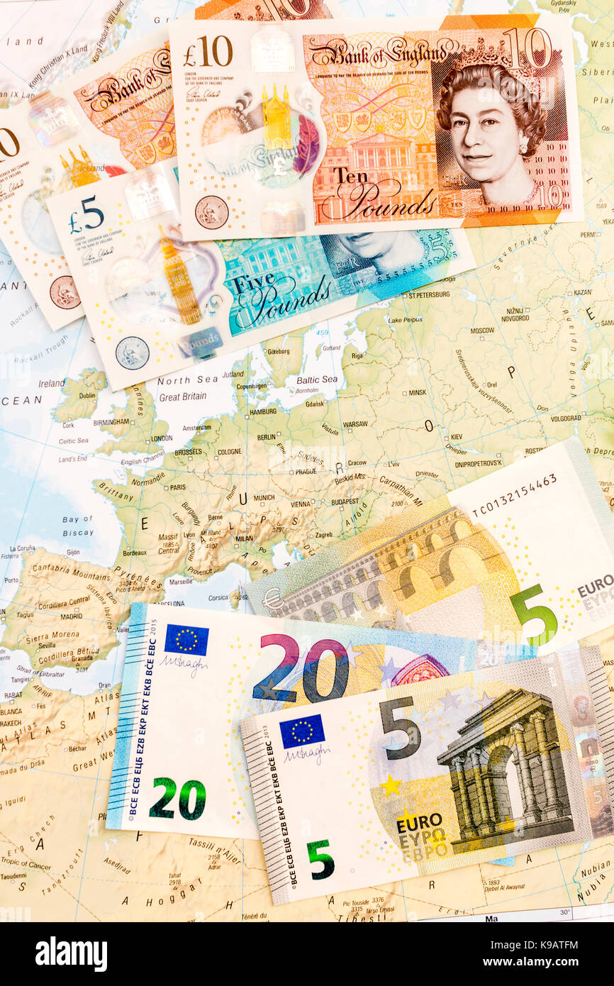 Europe. Map of Europe with euro and British banknotes on top Stock ...