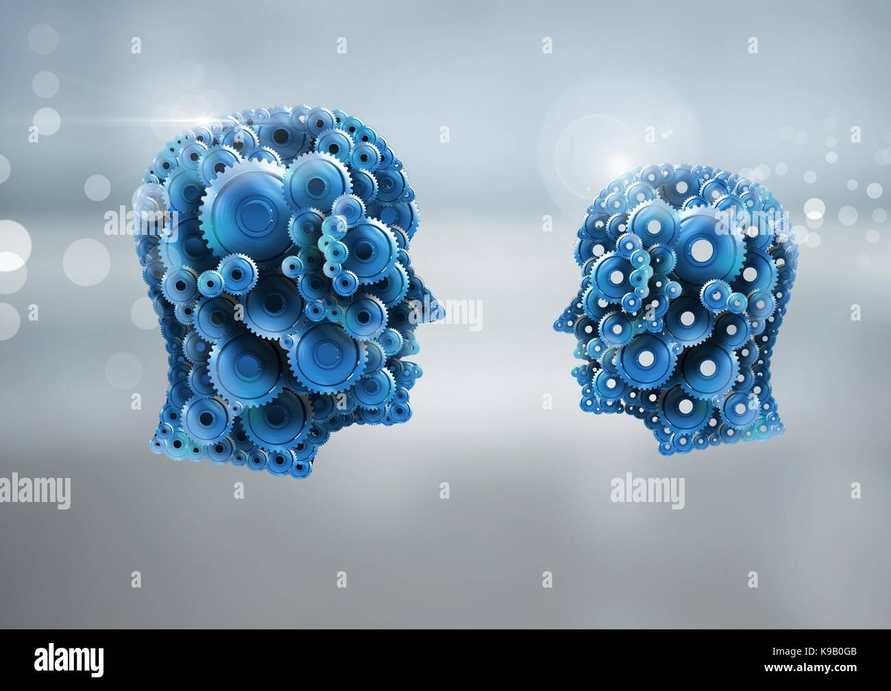 Digital composite of Cog heads with bright background Stock Photo - Alamy