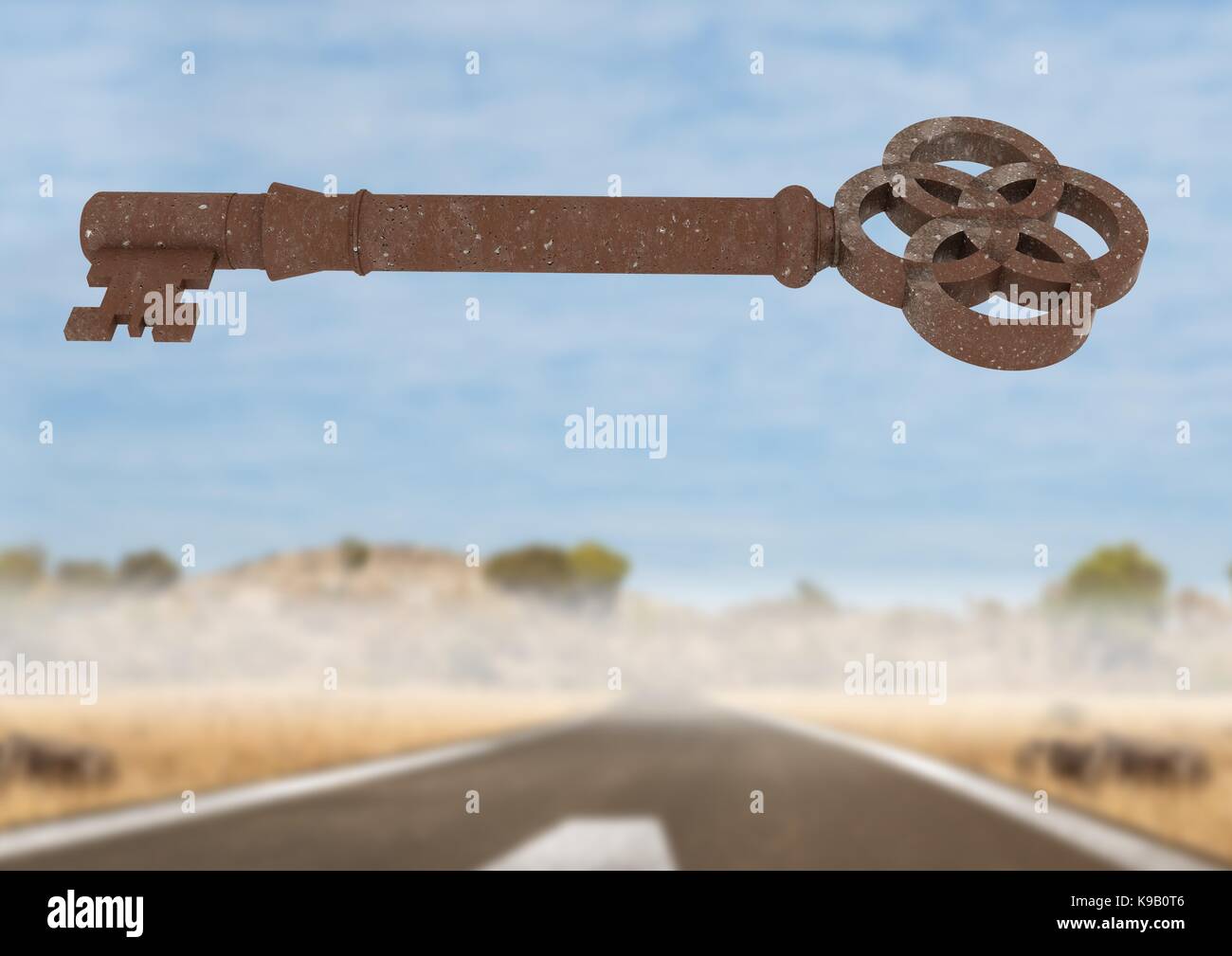 Digital composite of 3D Rustic Key floating over desert road Stock ...
