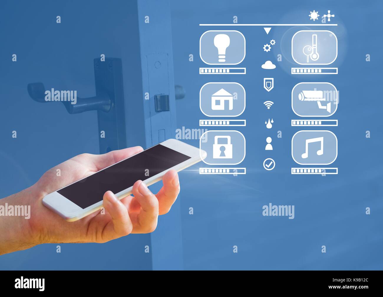 Digital composite of Hand holding phone with smart home interface at ...