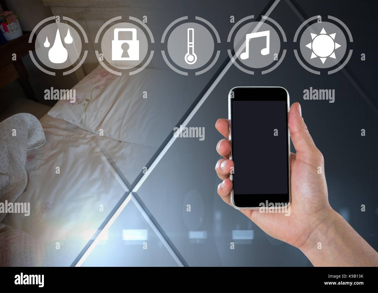 Digital composite of Hand holding phone with smart home interface at ...