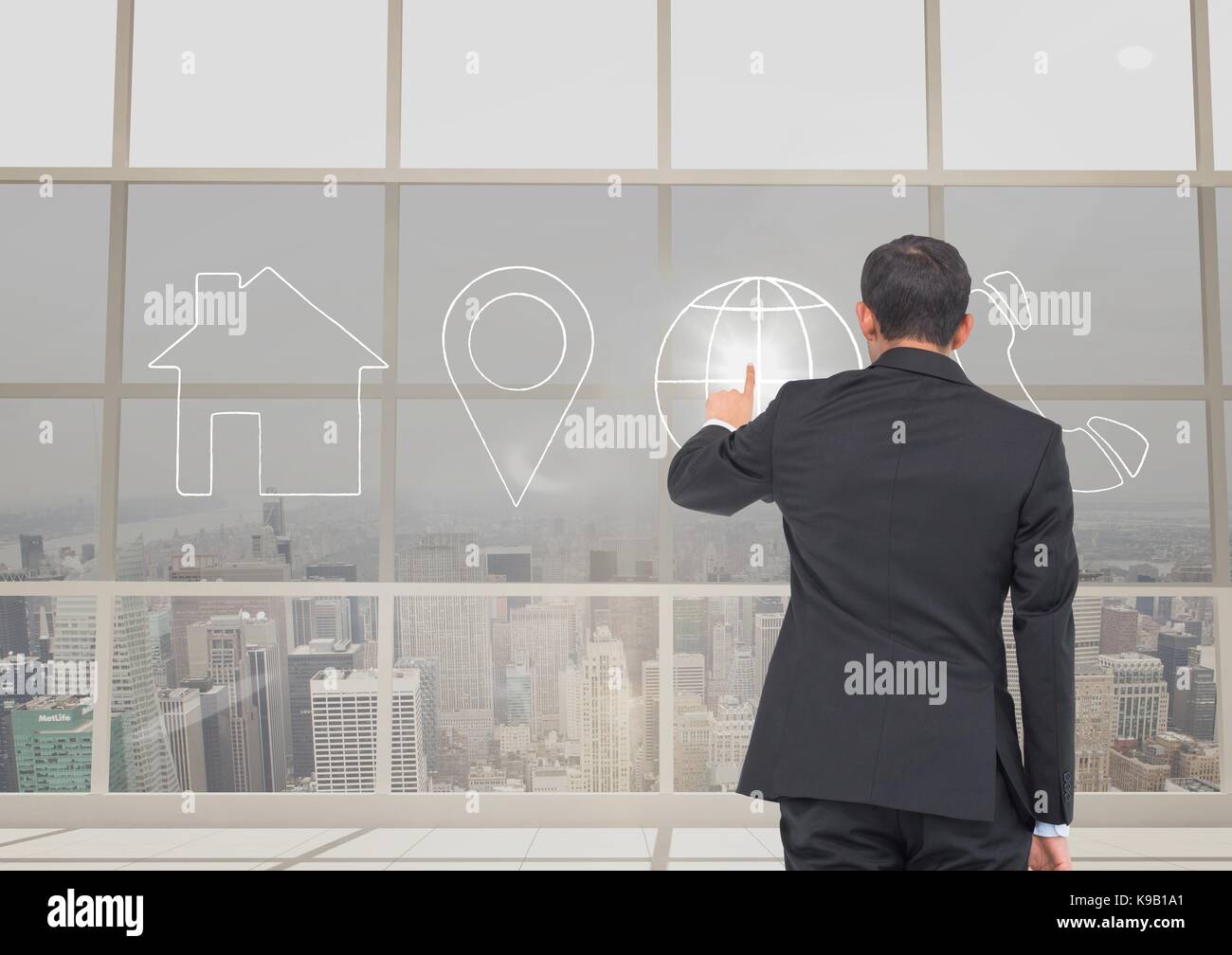 Digital composite of businessman using contact icon interface in office ...