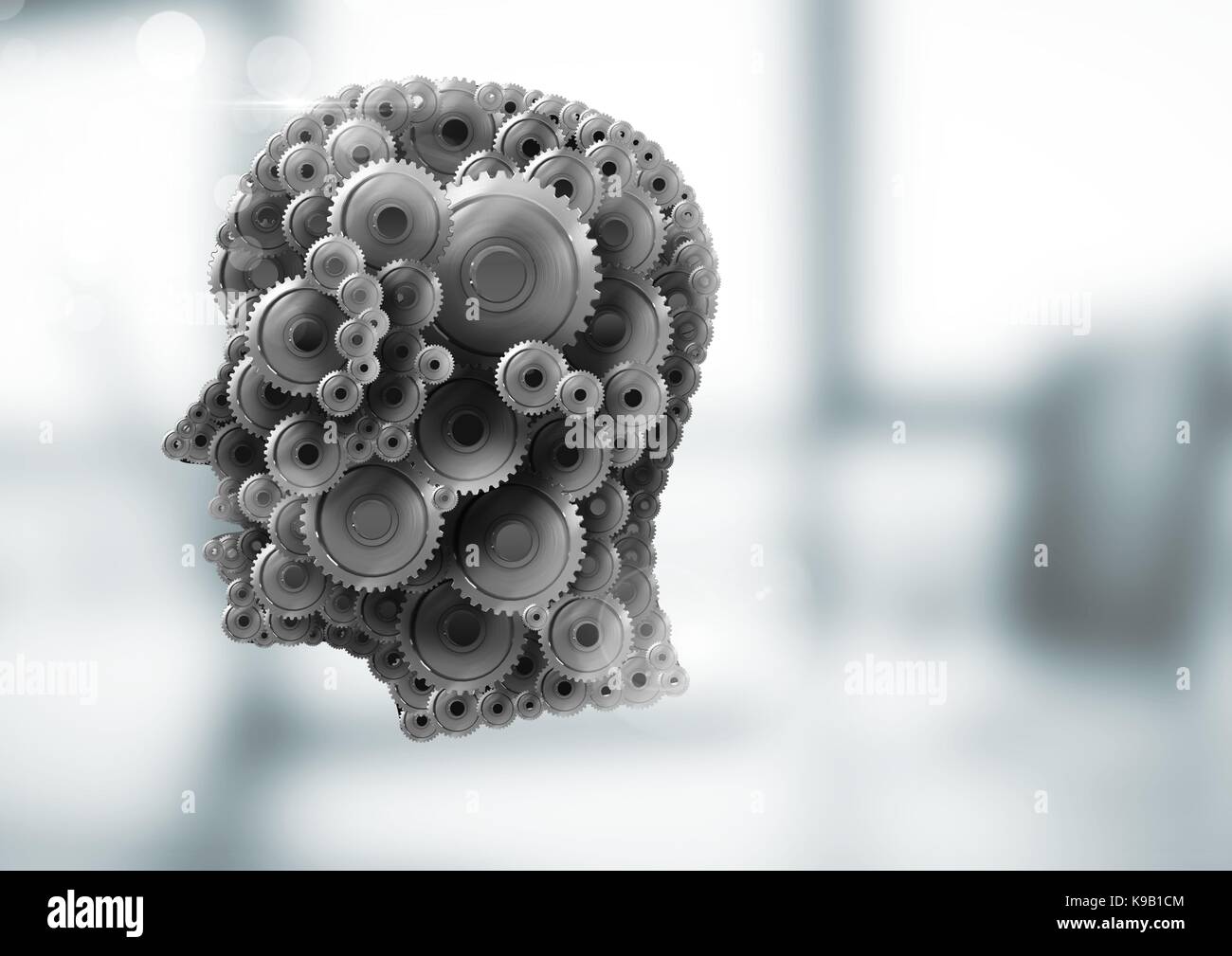 Digital composite of Cog head with bright background Stock Photo - Alamy
