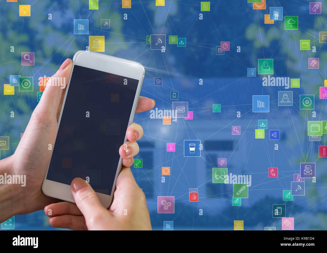 Digital composite of Hand holding phone with icon connectors Stock ...