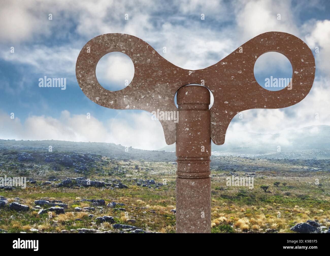 Digital composite of Rustic Key over rough barren landscape Stock Photo ...