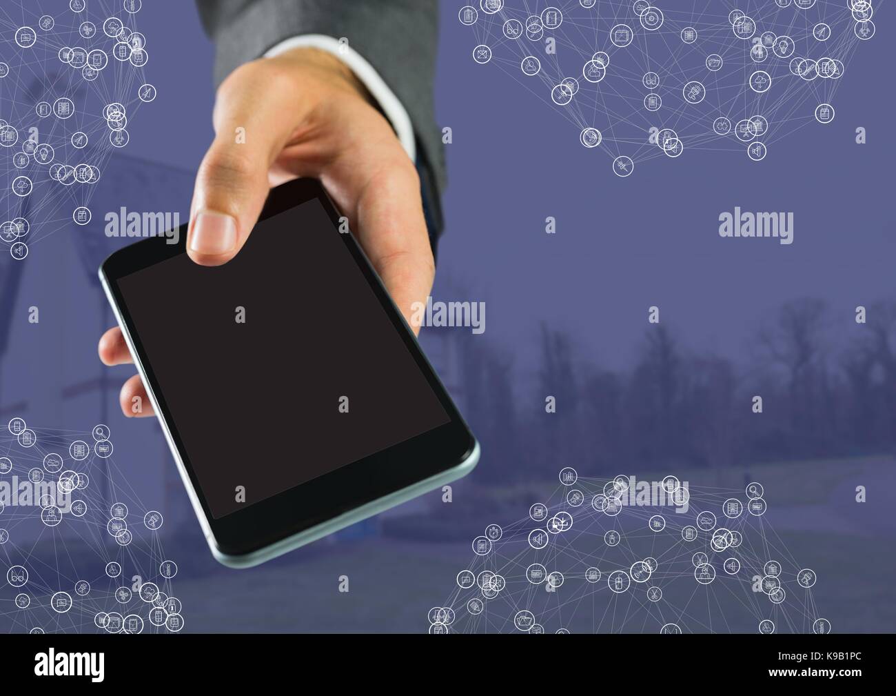 Digital composite of Hand holding phone with connectors Stock Photo - Alamy