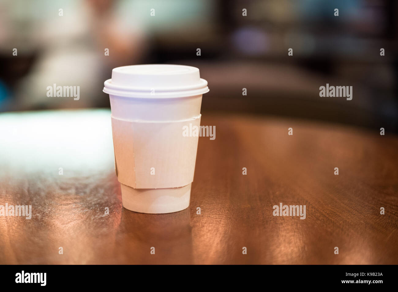 Take away coffee cup on table Stock Photo - Alamy