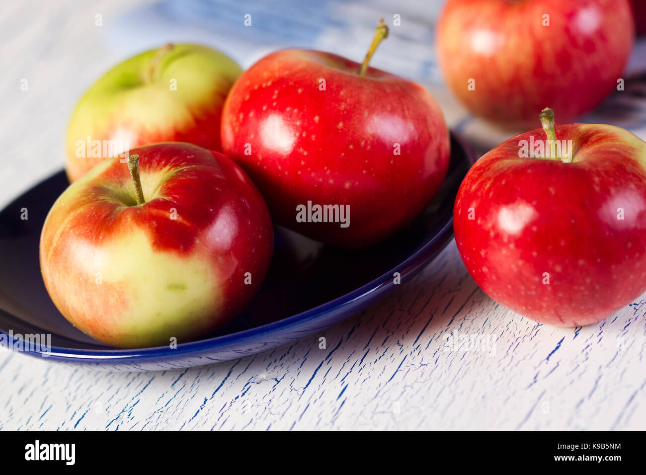 Apples in plate on hi-res stock photography and images - Alamy
