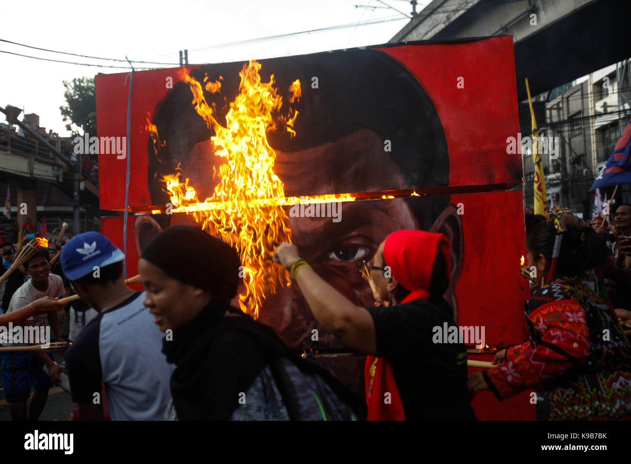 A cubic effigy painted with the face of President Rodrigo Duterte is ...