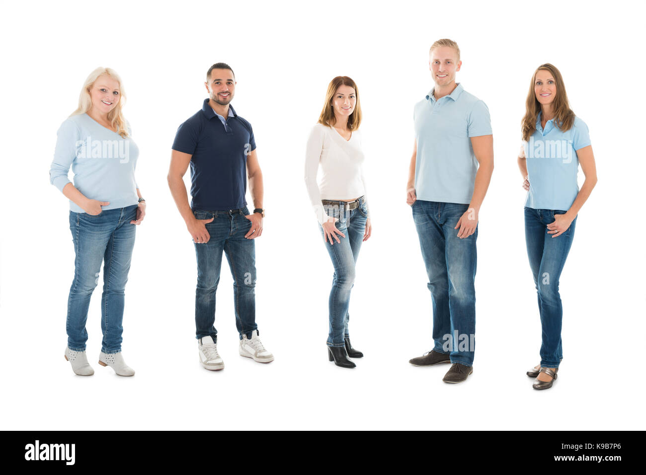 Full length portrait of confident people in casuals standing isolated ...