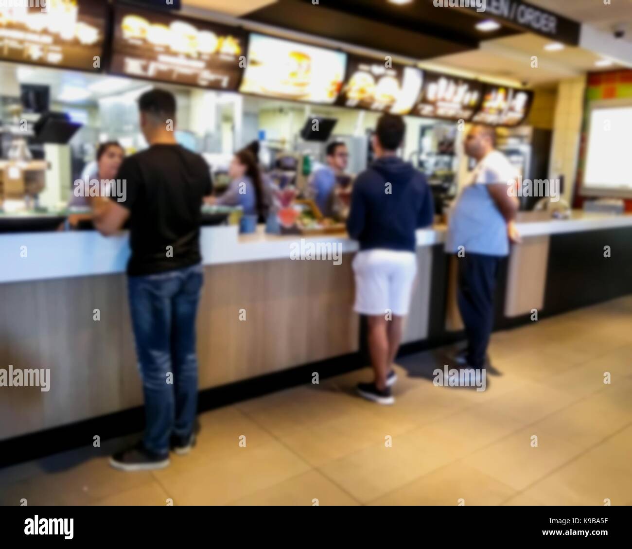 Blured view of Interior of typical fast food restaurant Stock Photo - Alamy