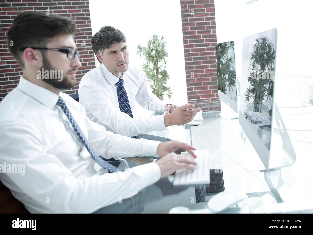 Employees of the company in the computer room Stock Photo - Alamy