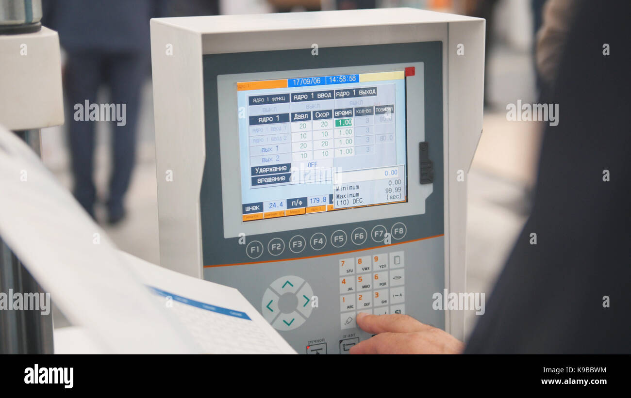 Energy security - system management panel. Man worker manipulates for ...