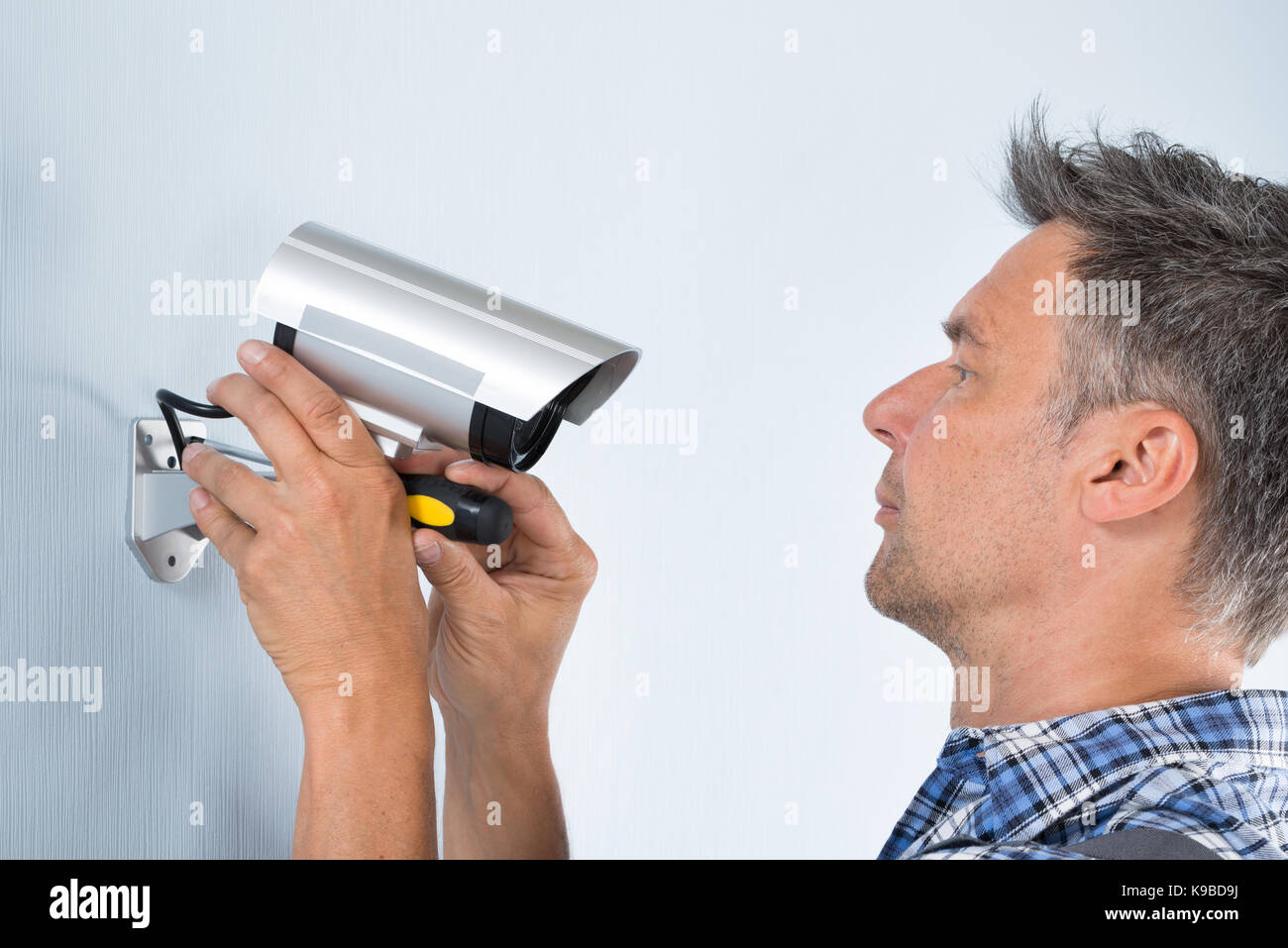 Cctv camera on wall hi-res stock photography and images - Alamy