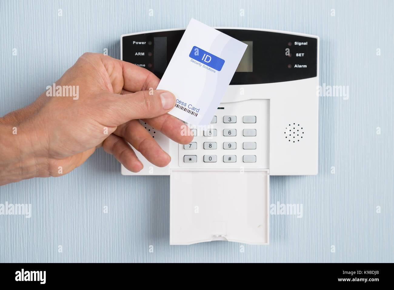 Close-up Of A Person Holding Security Card To Open Door. Photographer ...