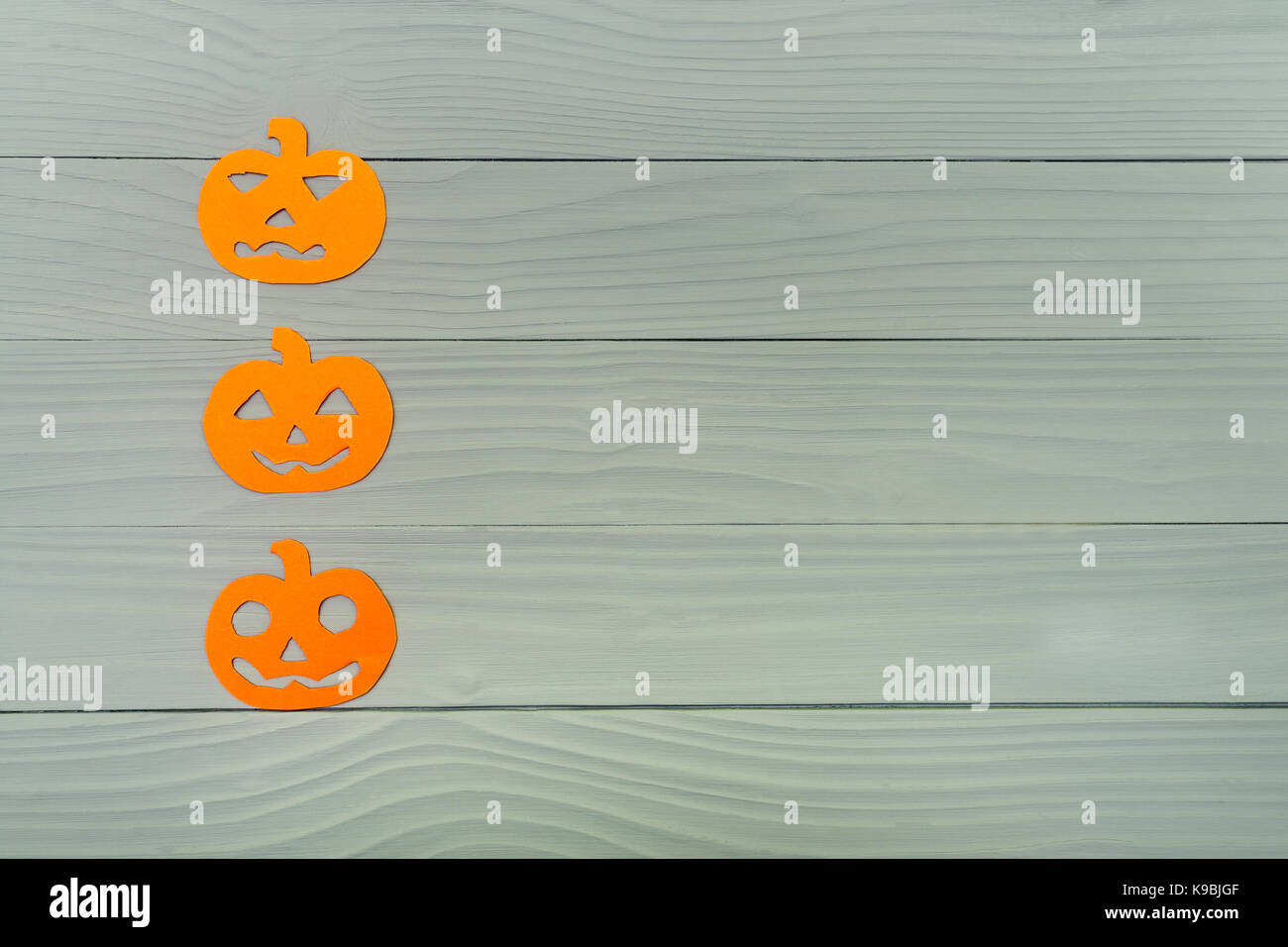 Paper silhouette of three different pumpkin left vertically Stock Photo ...
