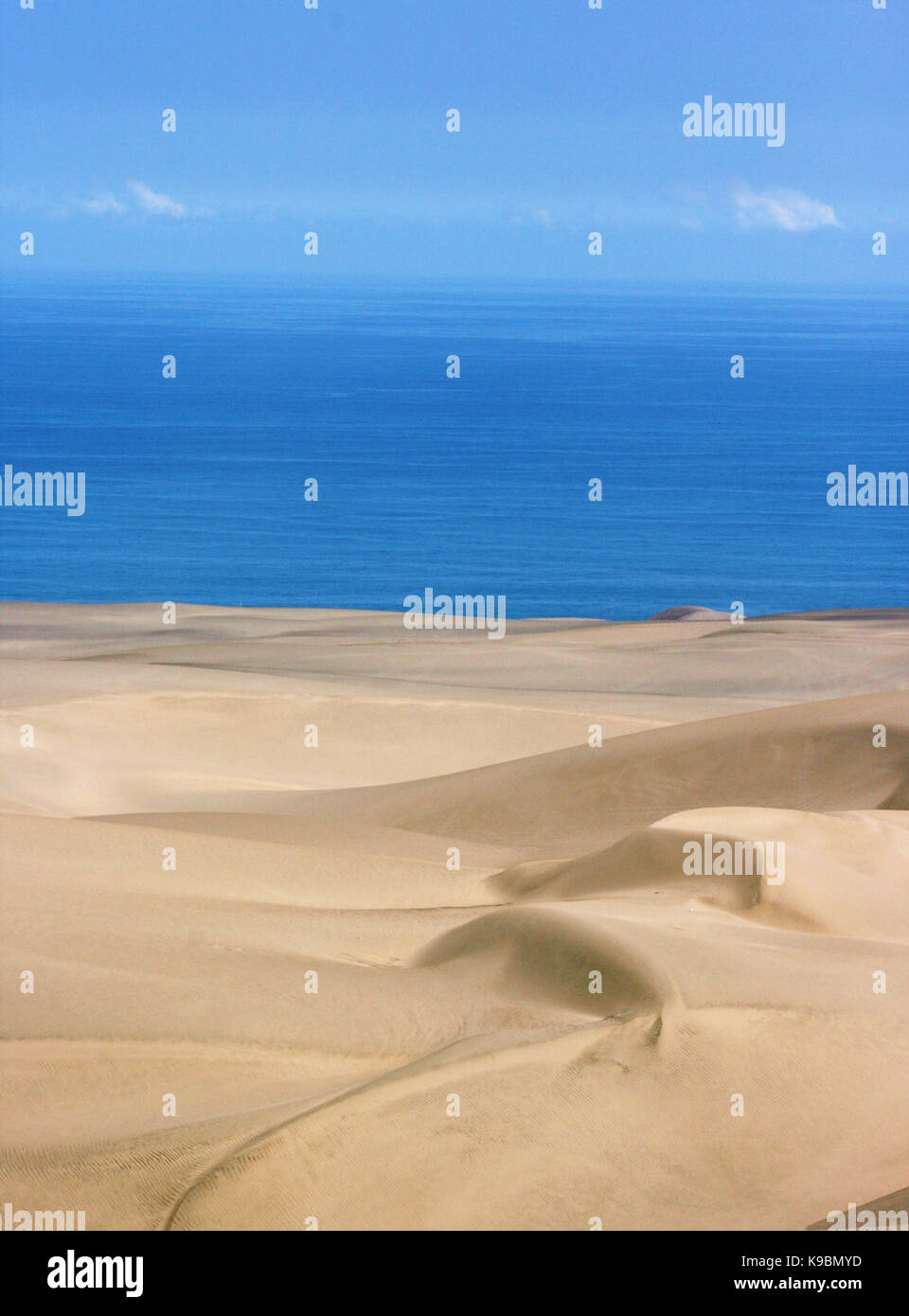 View of the ocean from the desert Stock Photo - Alamy