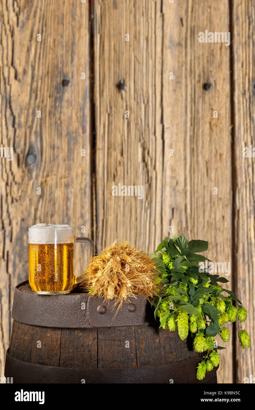 Still Life with Beer and Hops on the Wooden Background Stock Photo - Alamy
