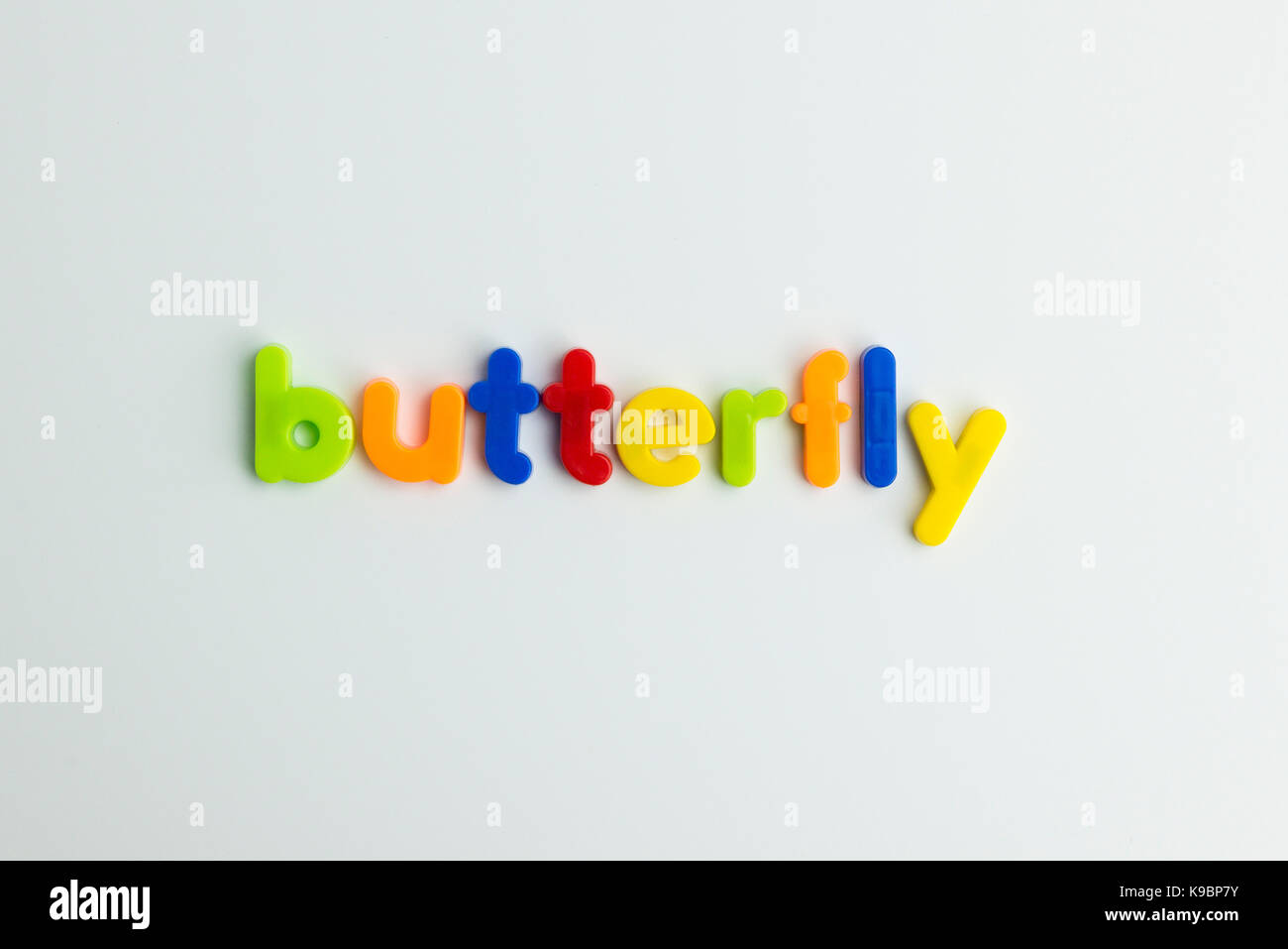 butterfly word in colourful children's letters Stock Photo - Alamy