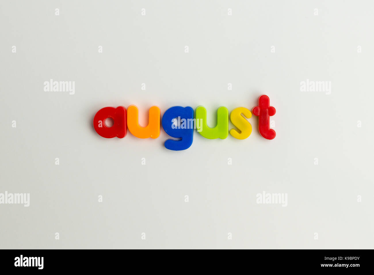 august word in colourful children's letters Stock Photo - Alamy